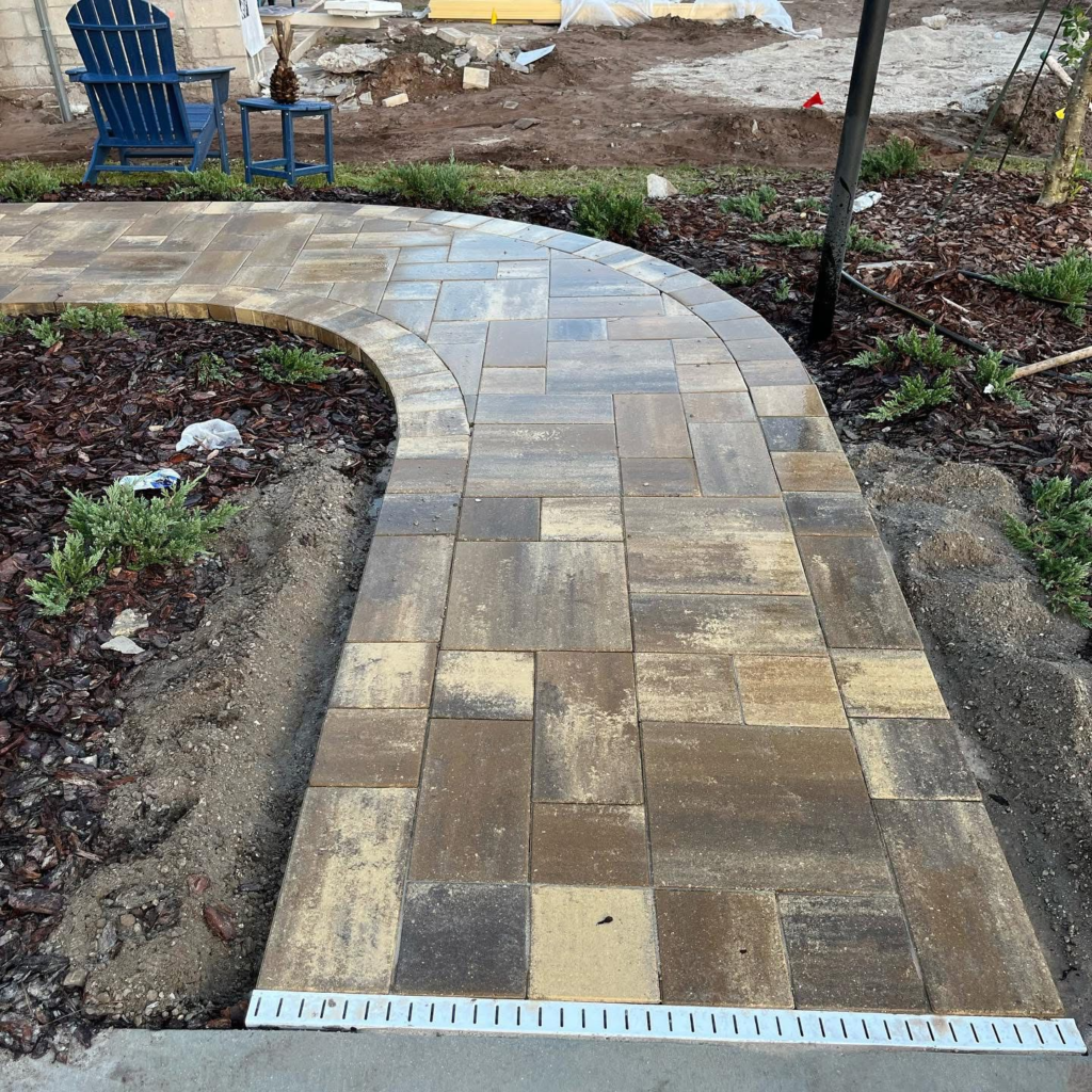 Backyards & Custom Sidewalks - Paving Our Way